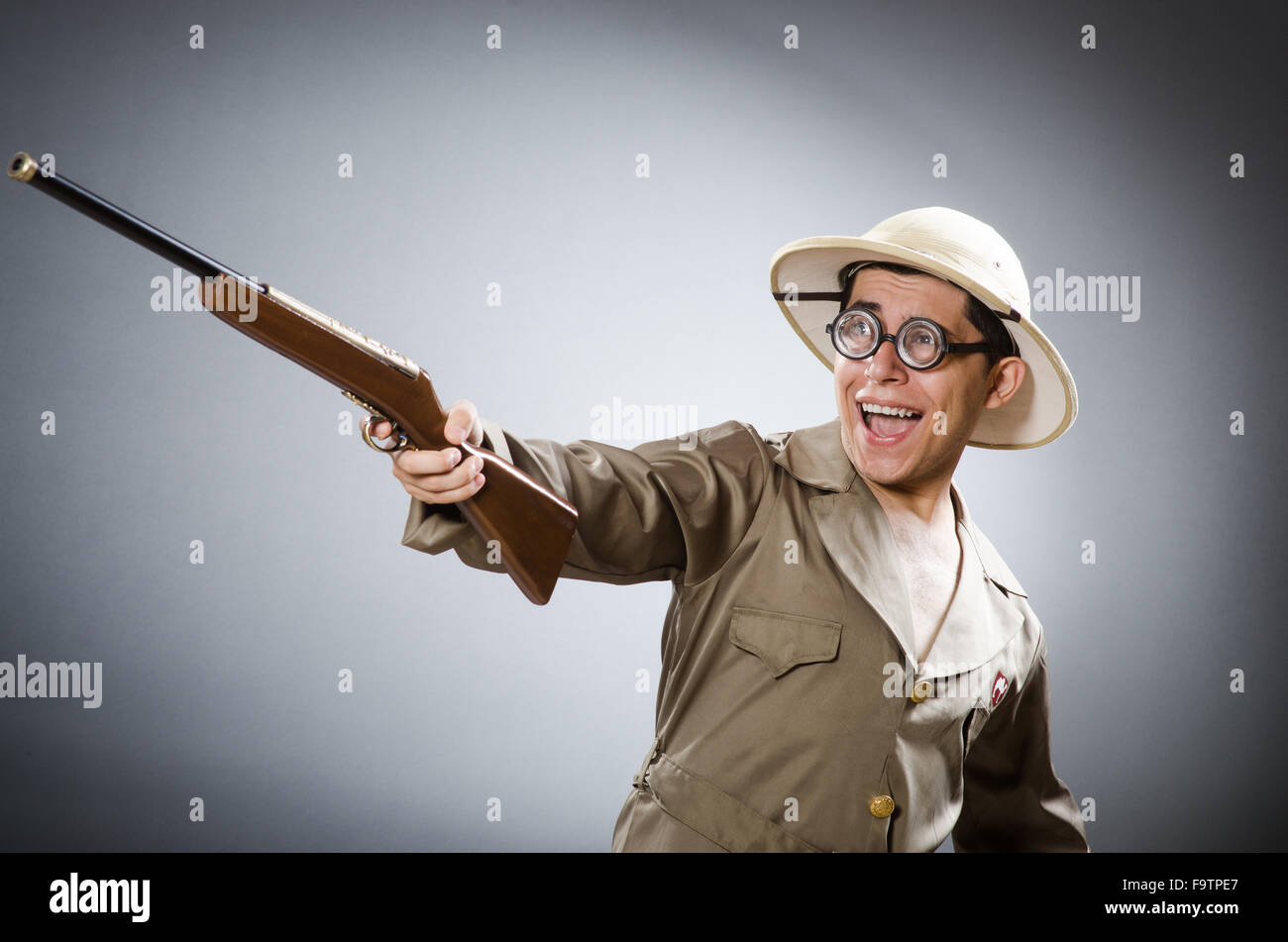 Funny hunter in hunting concept Stock Photo - Alamy