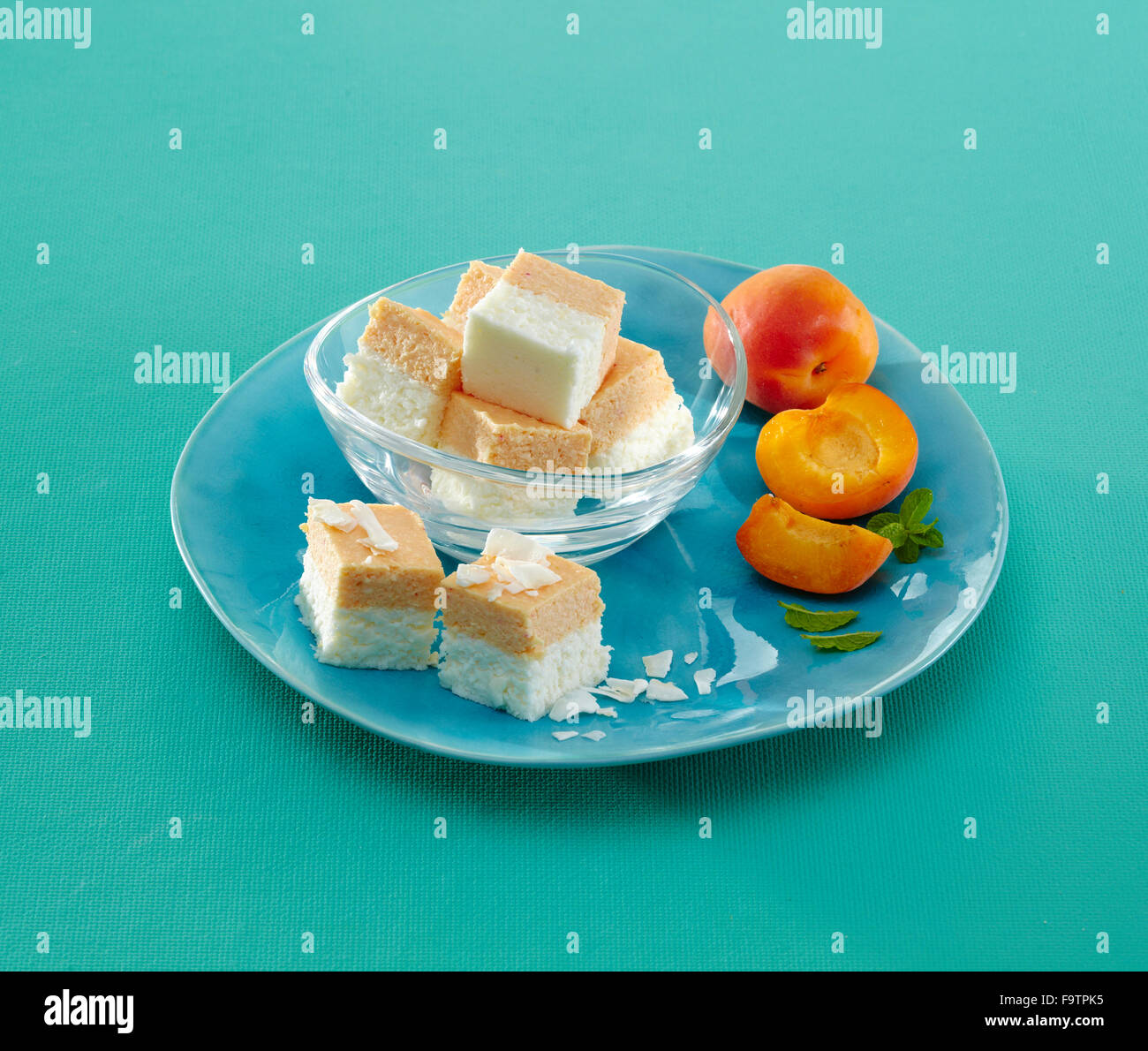 Frozen coco cubes with apricots Stock Photo - Alamy