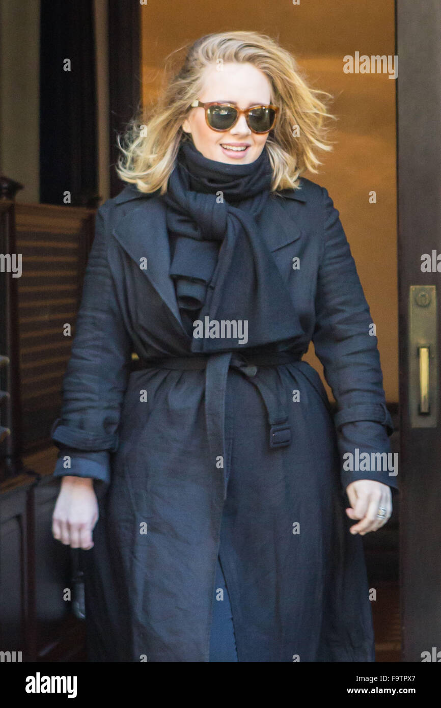 Adele signing autographs for fans outside her hotel ahead of her ...
