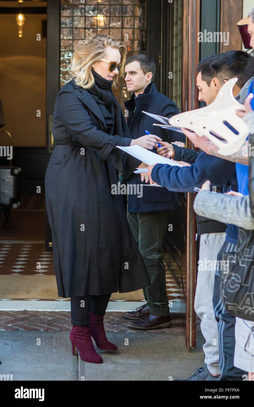 Adele signing autographs for fans outside her hotel ahead of her ...