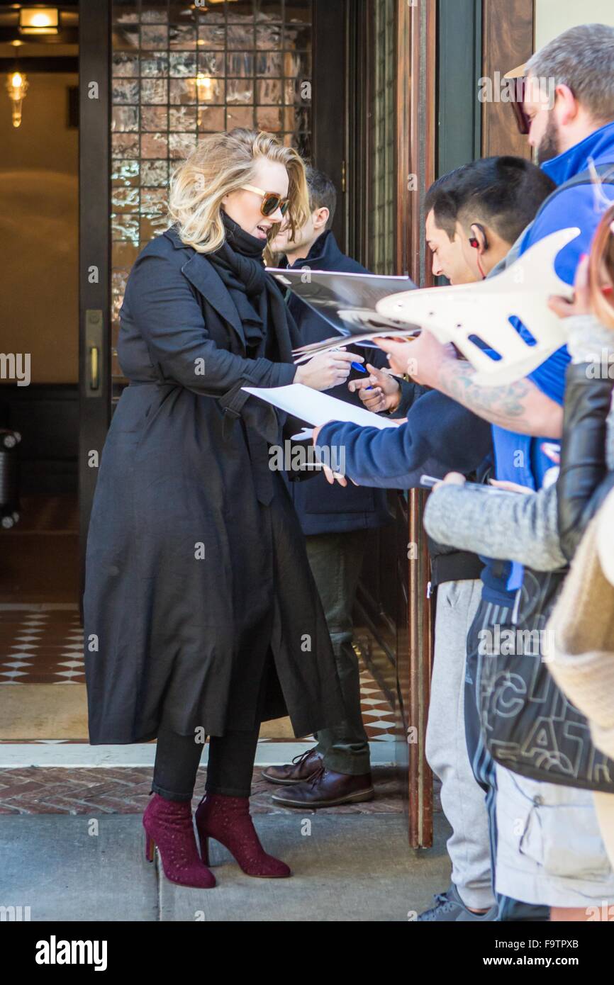 Adele signing autographs for fans outside her hotel ahead of her ...