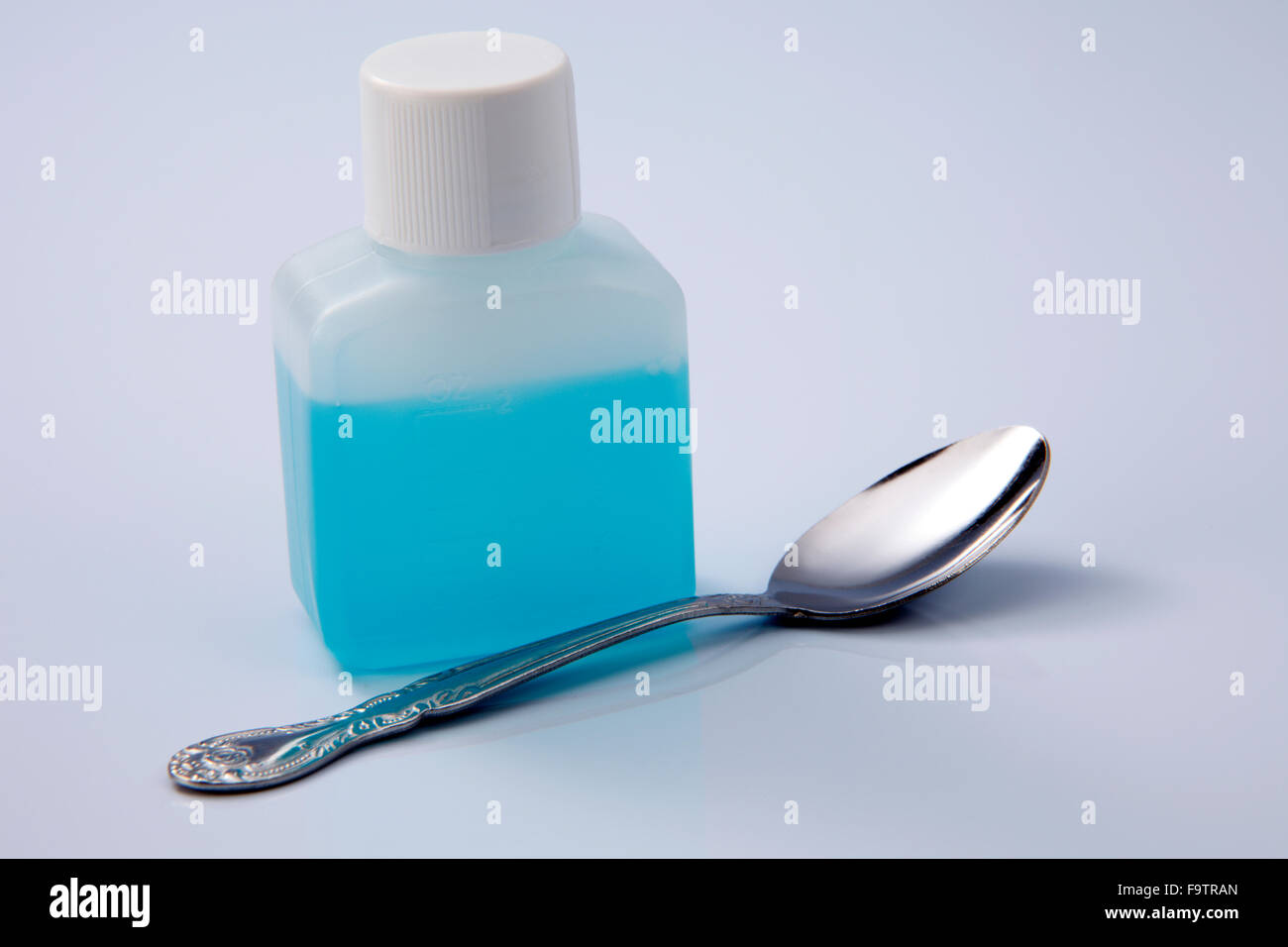 liquid medicine in the plastic bottle Stock Photo - Alamy