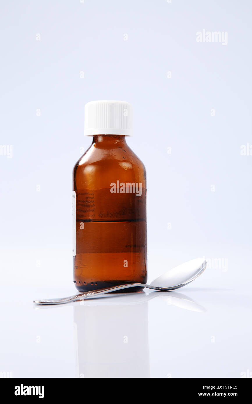 liquid medicine in the brown bottle Stock Photo - Alamy