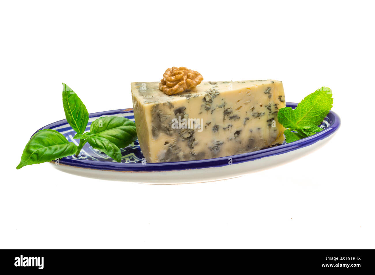Dor blue cheese with herbs, nuts and honey Stock Photo - Alamy