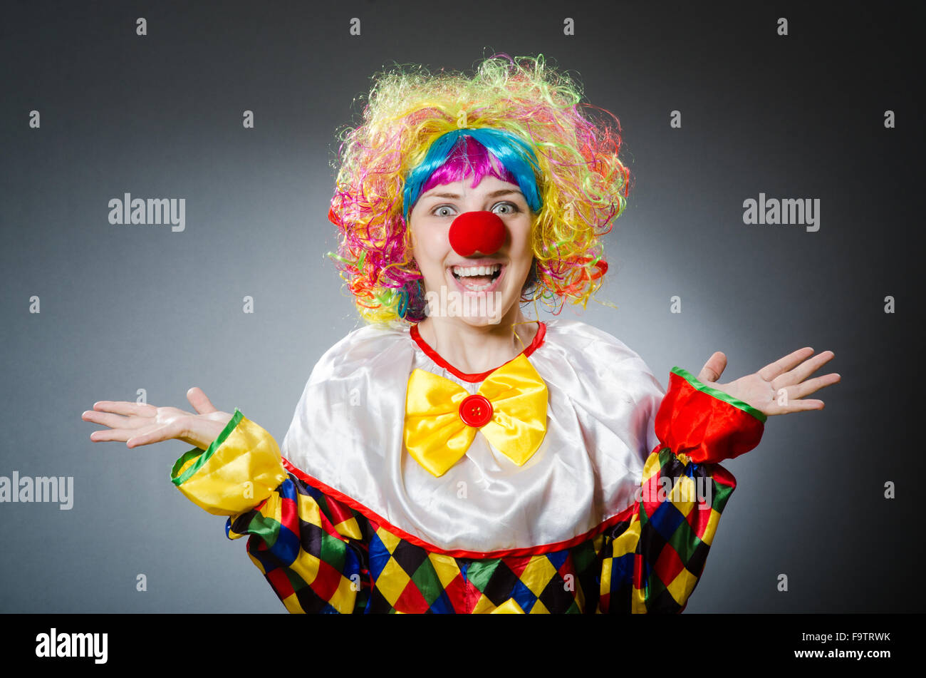 Funny clown in comical concept Stock Photo - Alamy