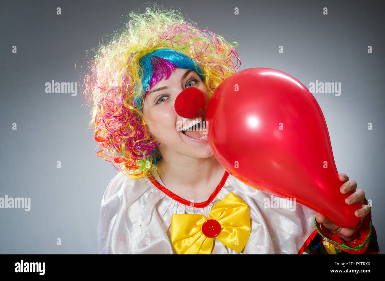 Funny clown in comical concept Stock Photo - Alamy