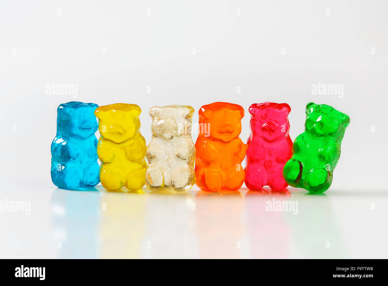Fruit flavored gummy bears in assorted colors Stock Photo - Alamy
