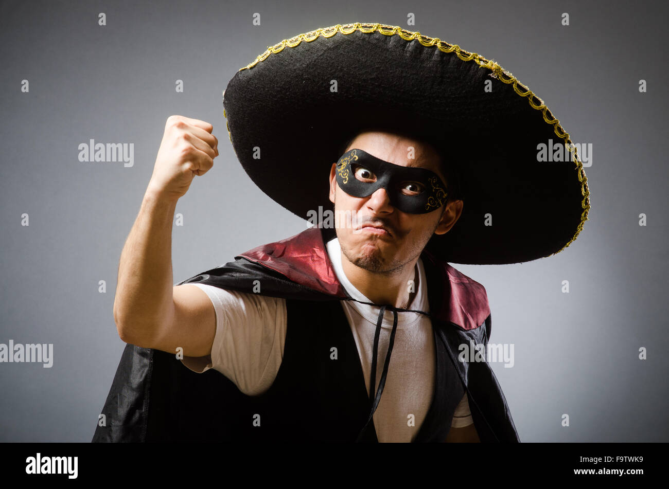 Person wearing sombrero hat in funny concept Stock Photo - Alamy