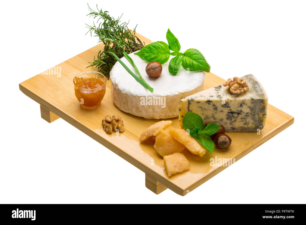 Assorted cheese - brie, dor blue and hard old yellow cheese Stock Photo ...
