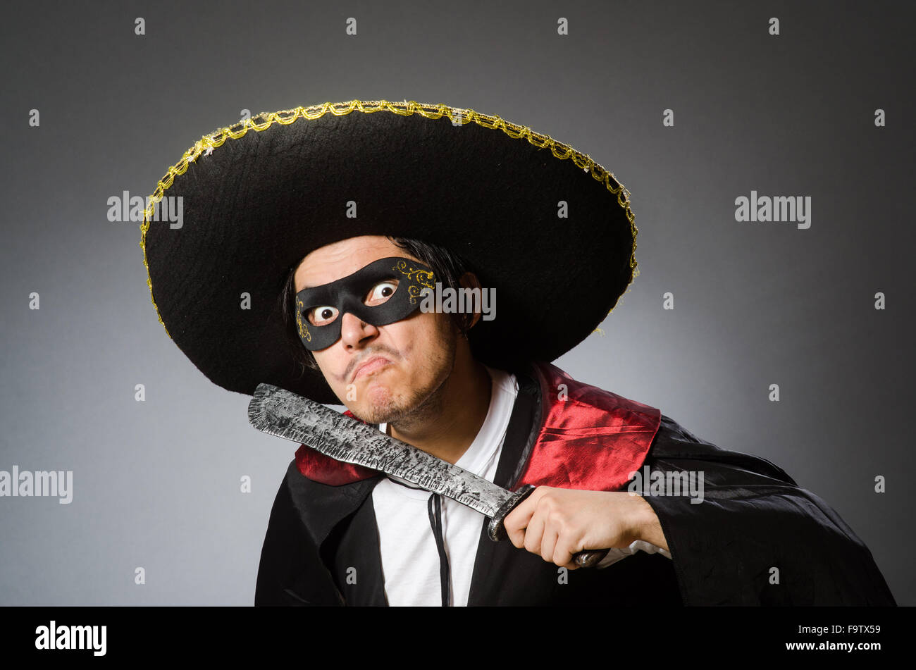 Person wearing sombrero hat in funny concept Stock Photo - Alamy