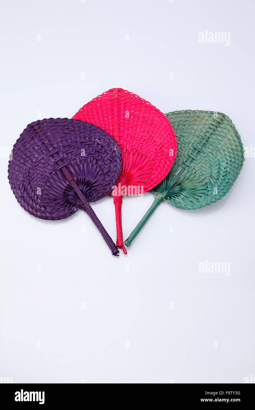 native fan made from palm leaves on white background Stock Photo - Alamy