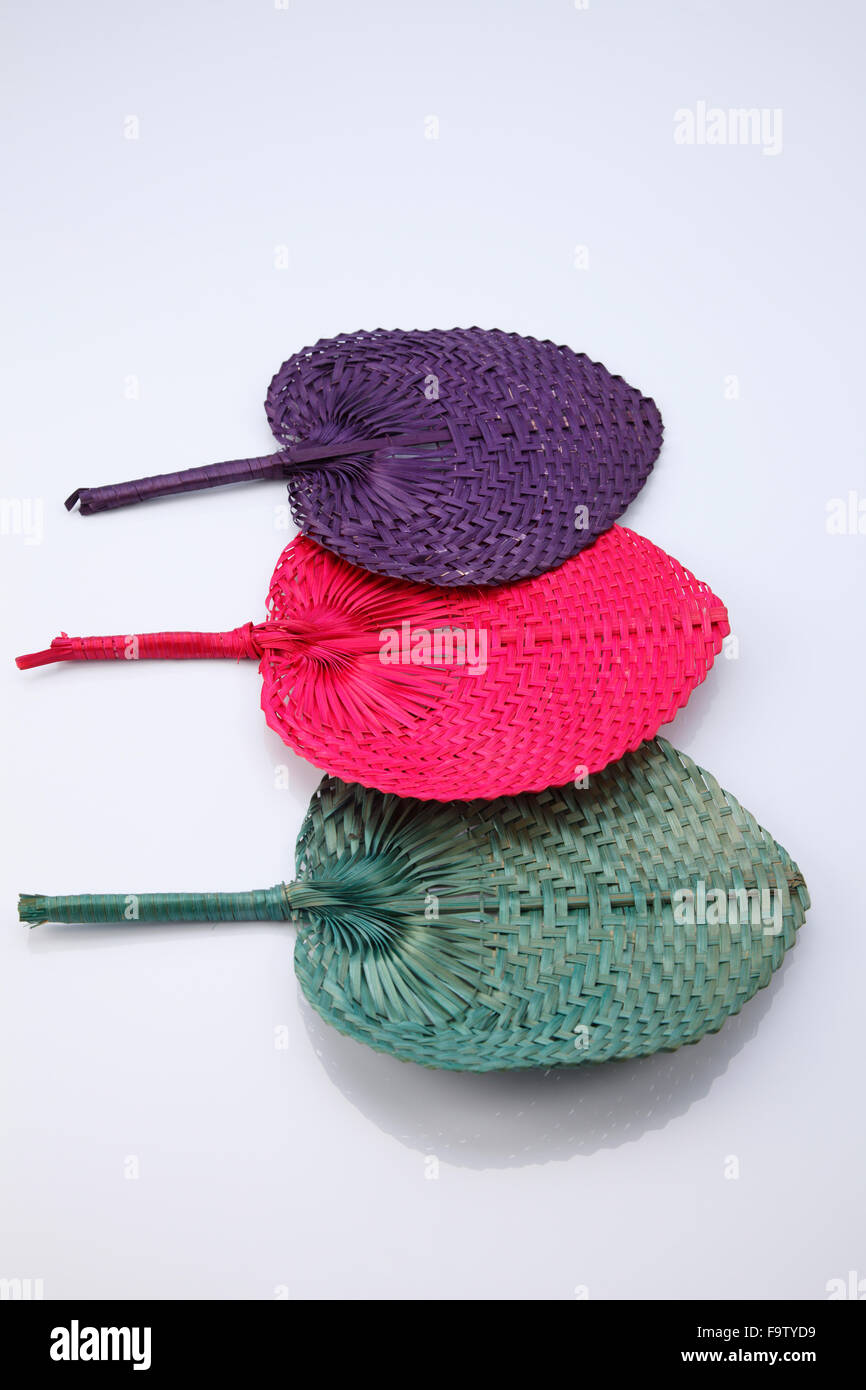 native fan made from palm leaves on white background Stock Photo - Alamy