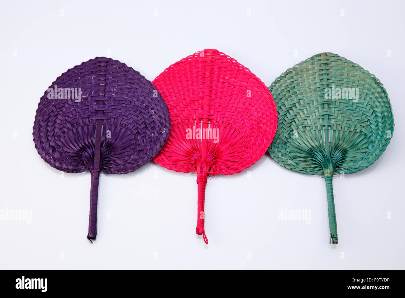 native fan made from palm leaves on white background Stock Photo - Alamy