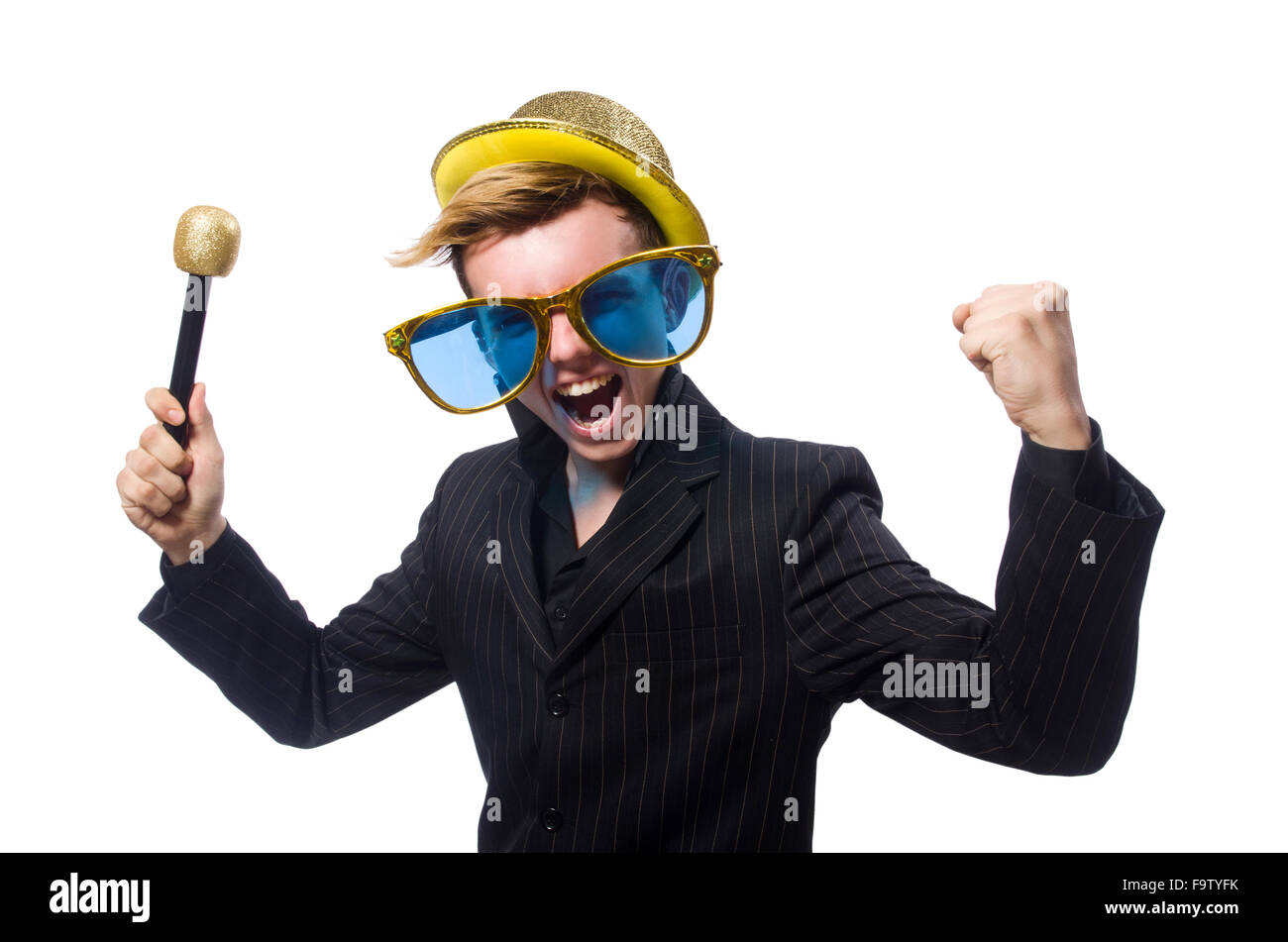 Singing man in karaoke concept Stock Photo - Alamy