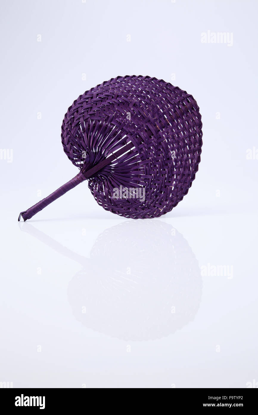 native fan made from palm leaves on white background Stock Photo - Alamy