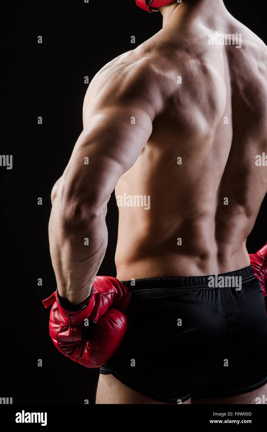 Muscular man in boxing concept Stock Photo - Alamy