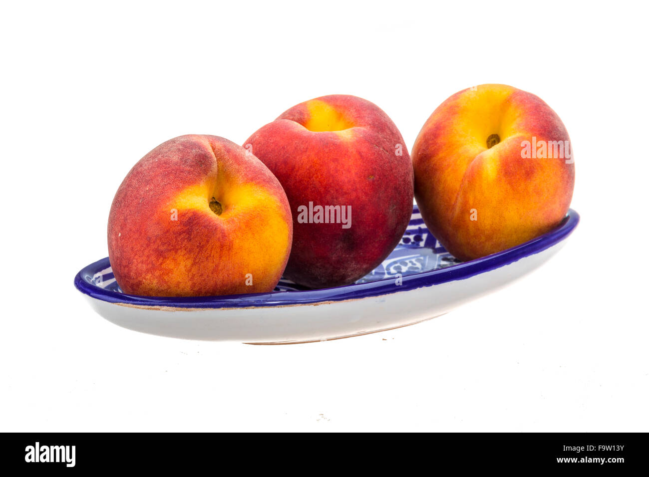 Bright ripe peaches isolated Stock Photo - Alamy