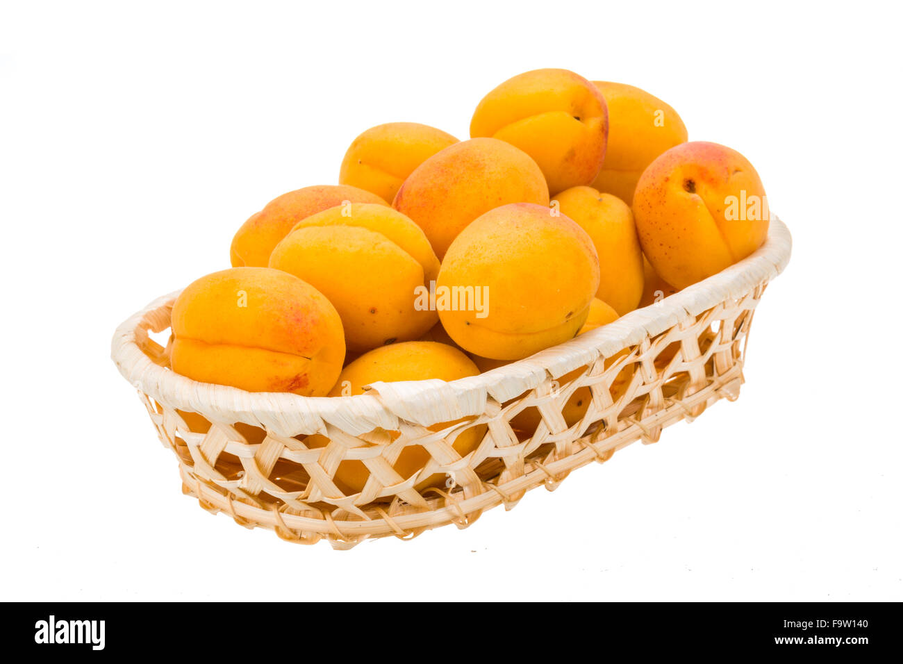 Yellow ripe apricots isolated Stock Photo - Alamy