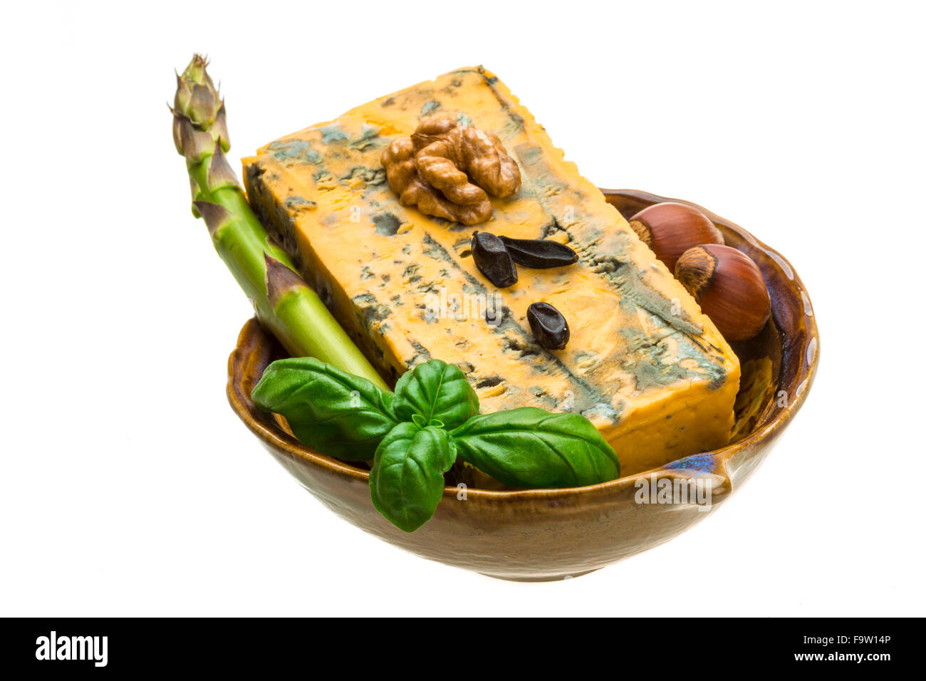 Gold cheese with mould Stock Photo - Alamy