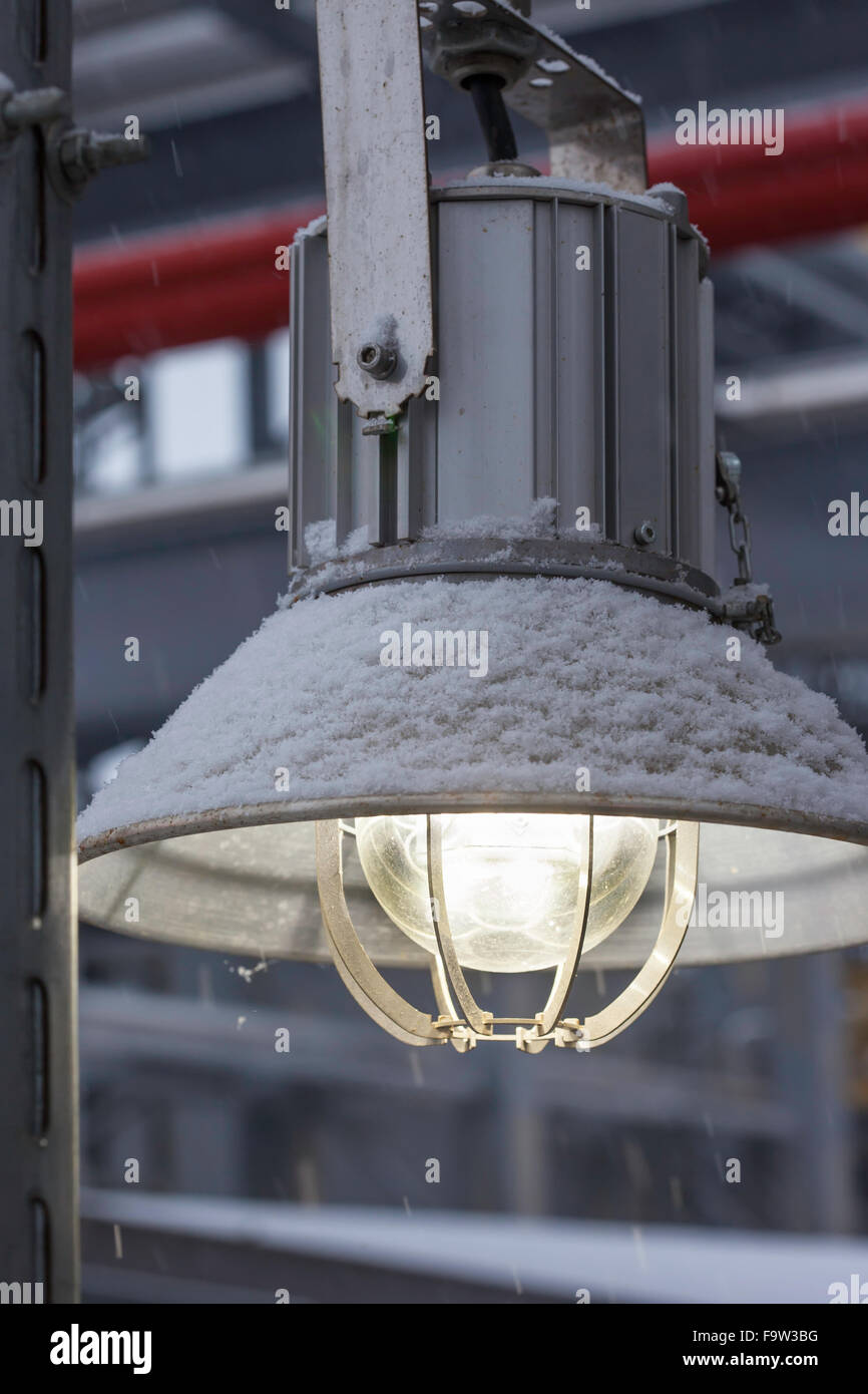 street industrial led lamp under snow closeup Stock Photo - Alamy