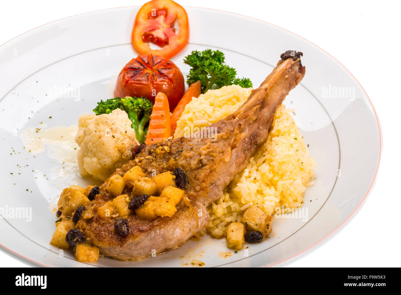 Pork t-bone steak with rice Stock Photo - Alamy