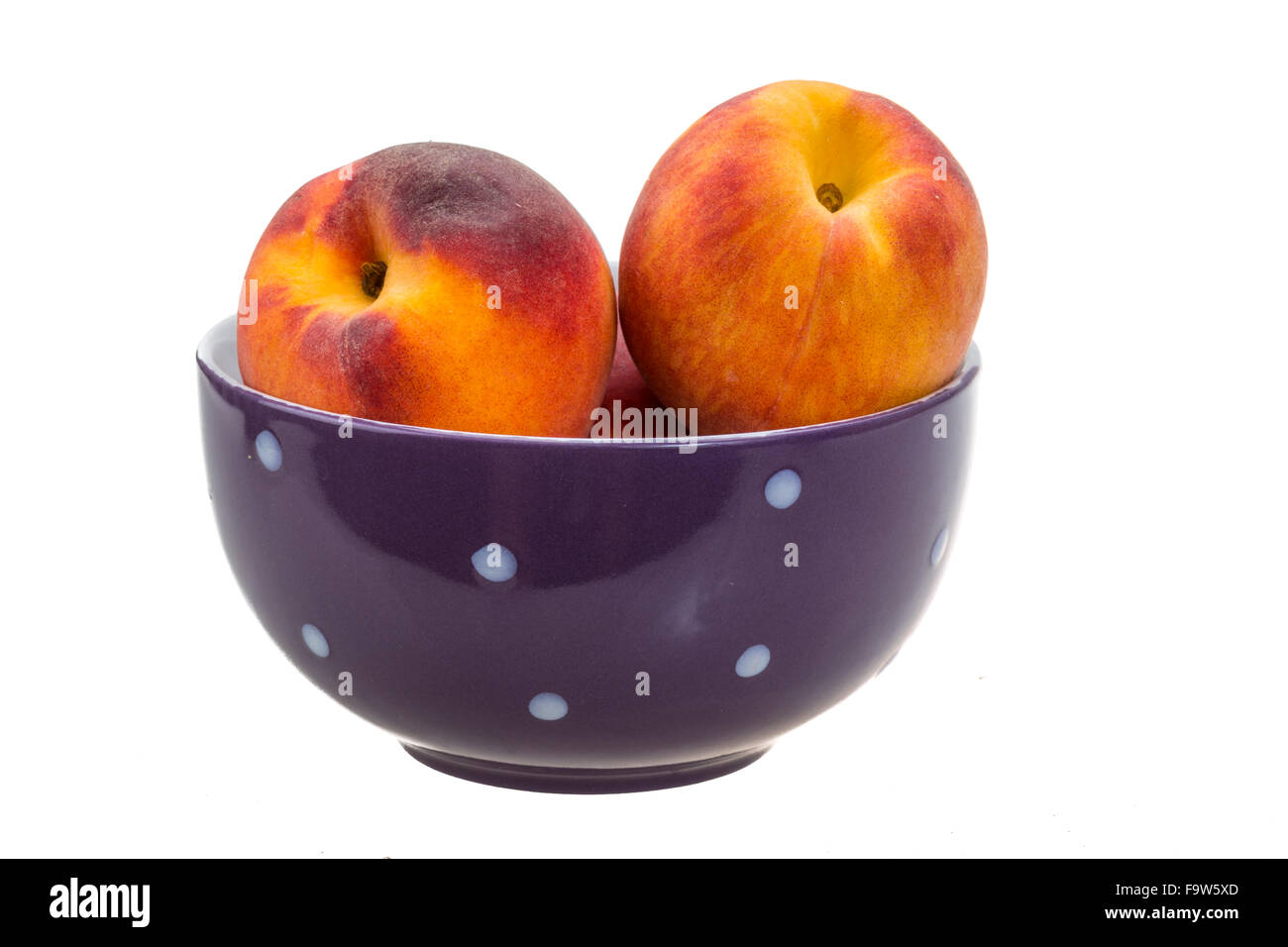 Bright ripe peaches isolated Stock Photo - Alamy