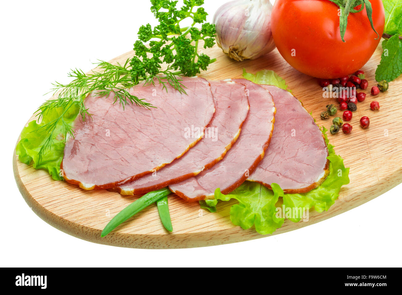 Ripe fresh ham with vegetables Stock Photo - Alamy