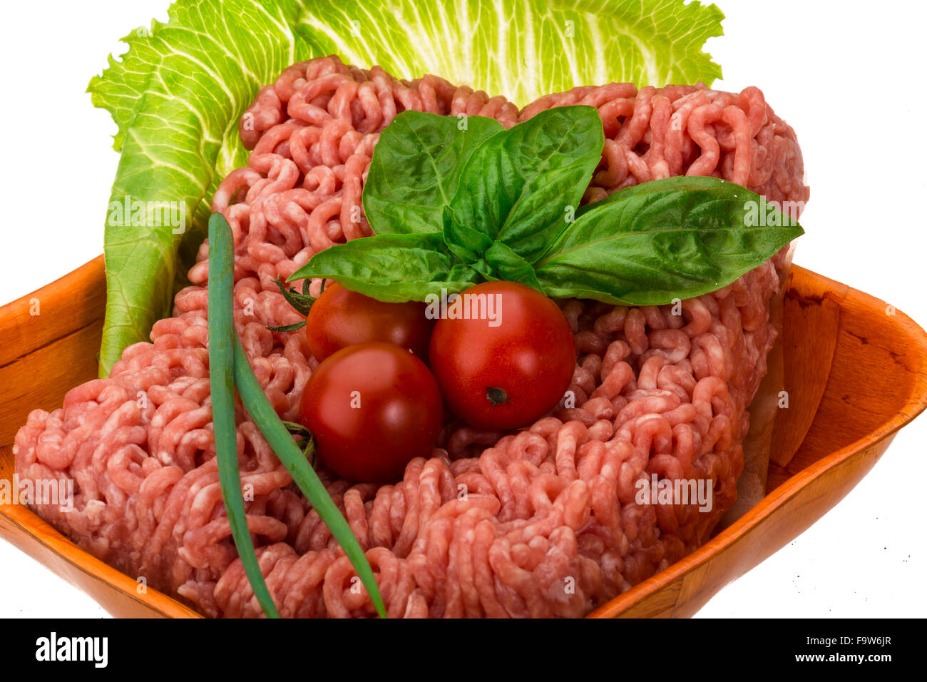 Meat stuffing with basil isolated Stock Photo - Alamy