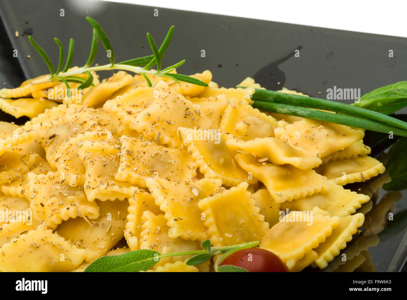 italian Ravioli with herbs isolated Stock Photo - Alamy