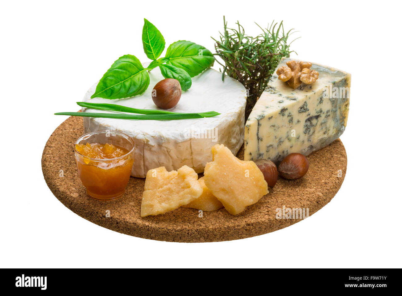Assorted cheese - brie, dor blue and hard old yellow cheese Stock Photo ...