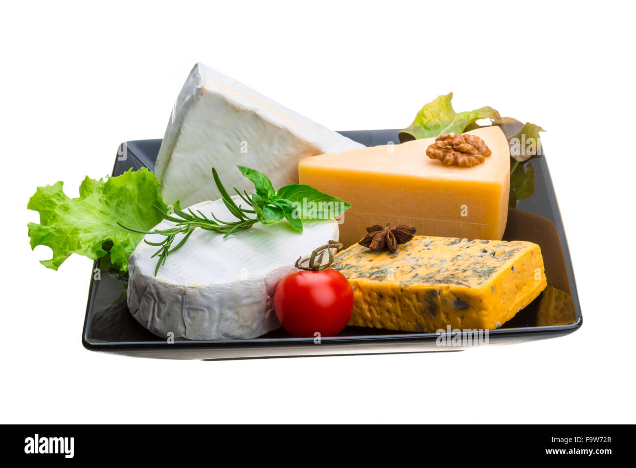 Variety cheese assortment with nuts and herbs Stock Photo - Alamy