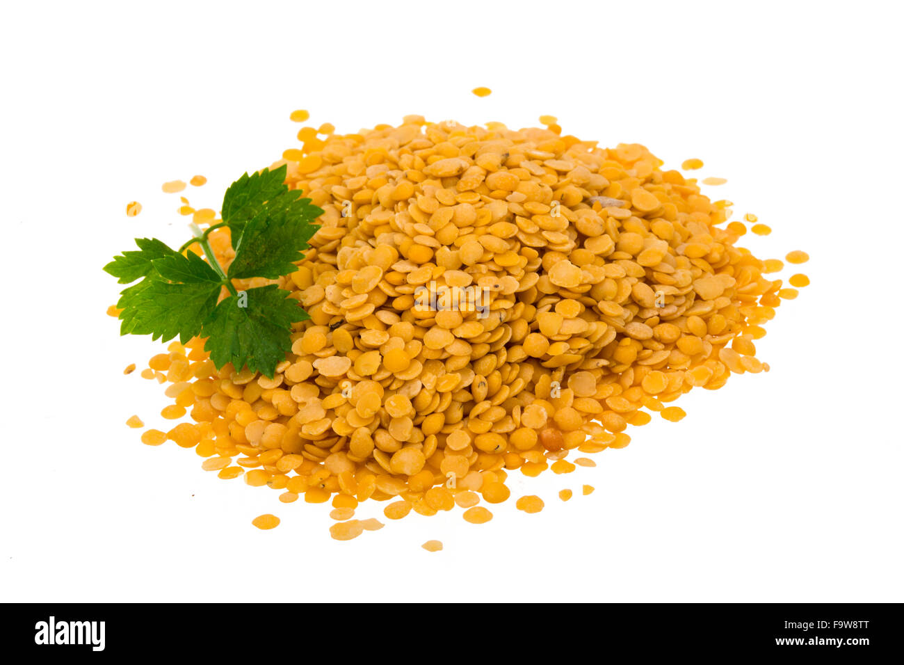 Yellow lentils isolated Stock Photo - Alamy