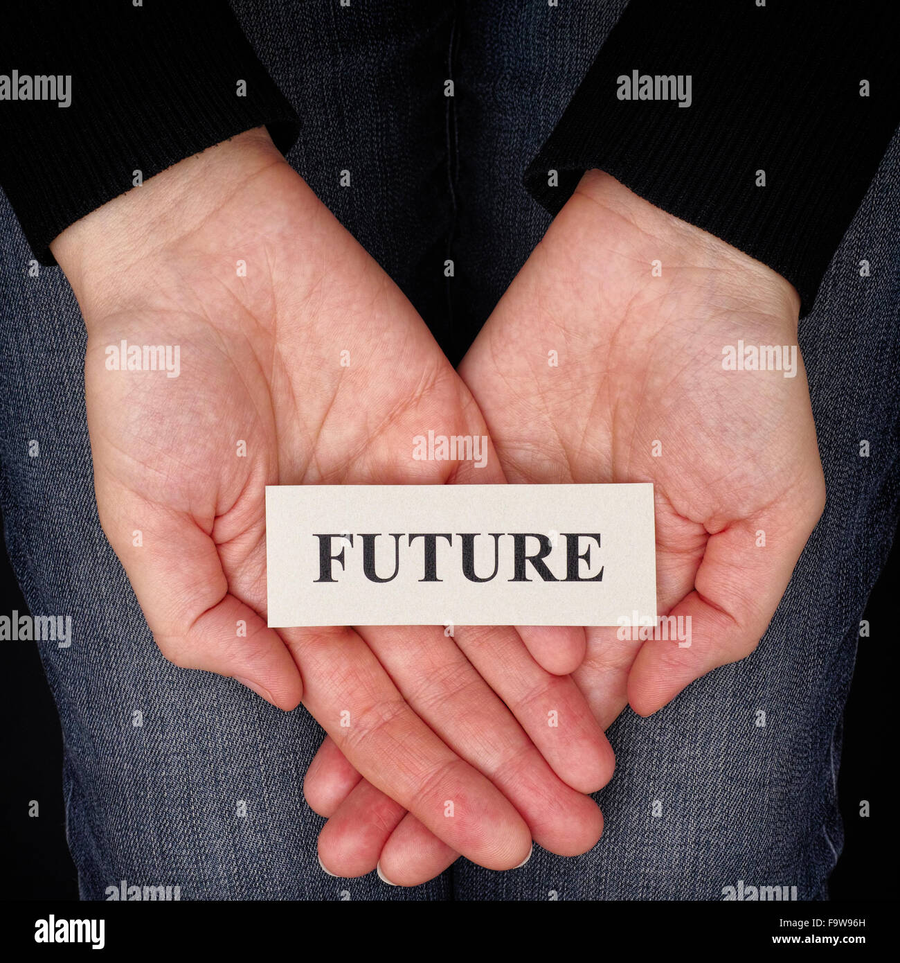 Woman holding word Future in her palms Stock Photo - Alamy