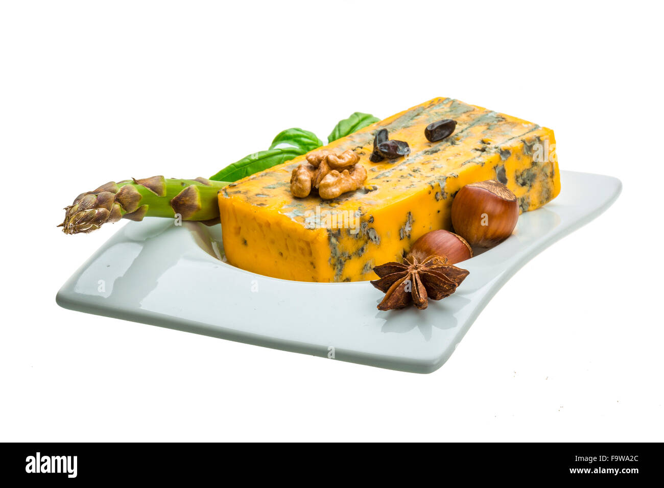 Gold cheese with mould Stock Photo - Alamy