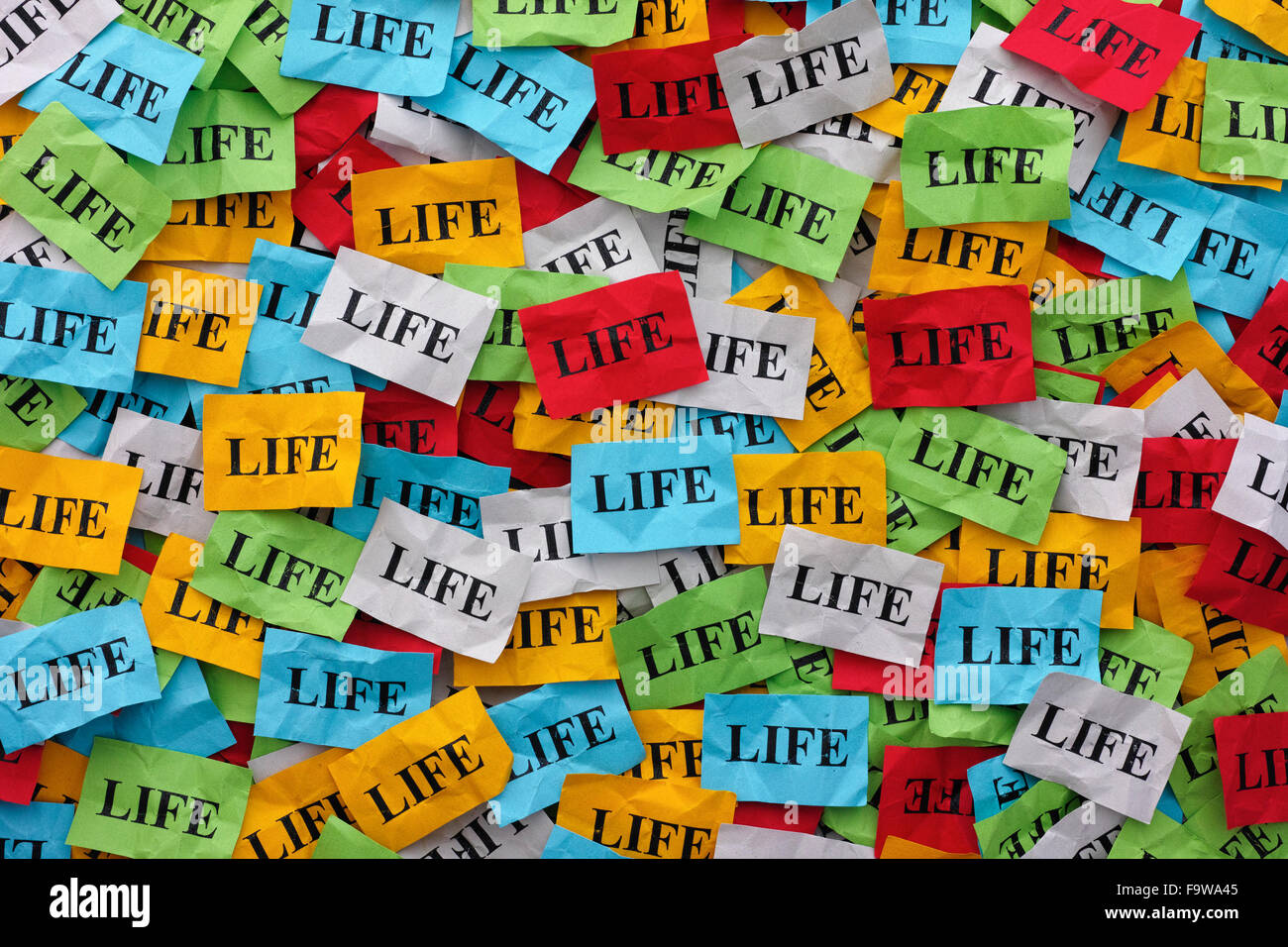 Life concept. Colorful pieces of paper with words Life Stock Photo - Alamy