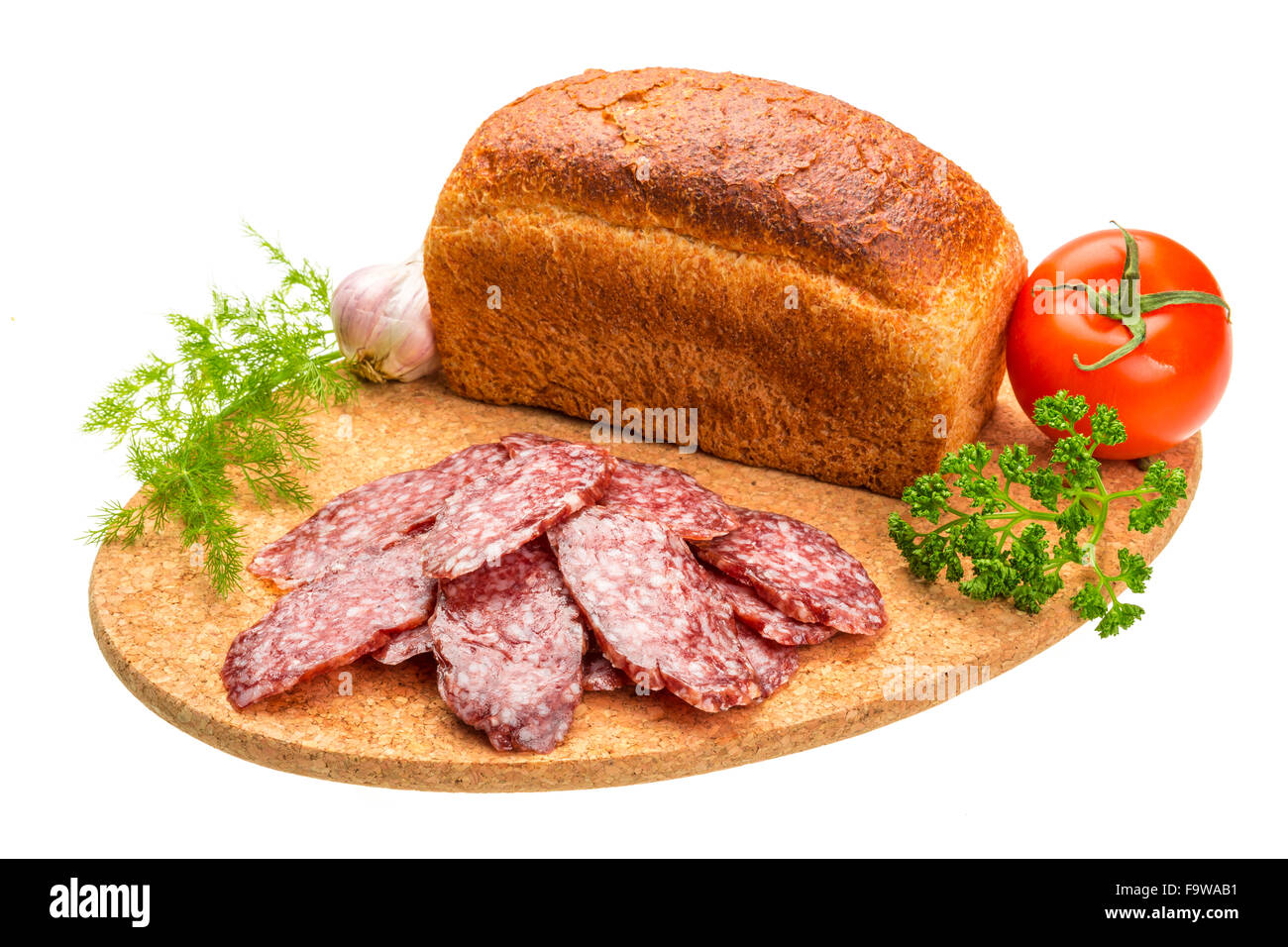 Fresh ripe salami with bread and vegetables Stock Photo - Alamy