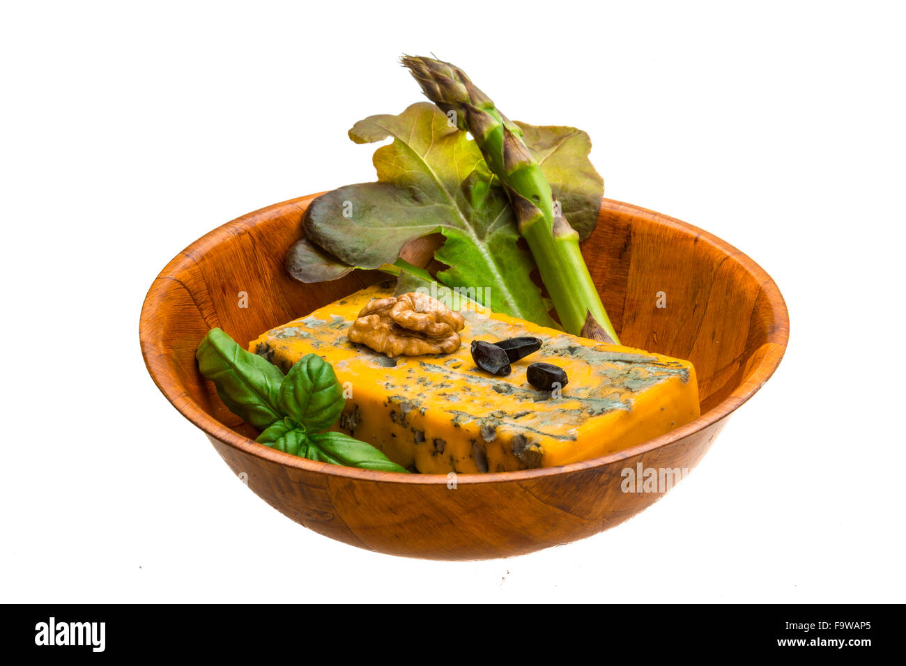 Gold cheese with mould Stock Photo - Alamy