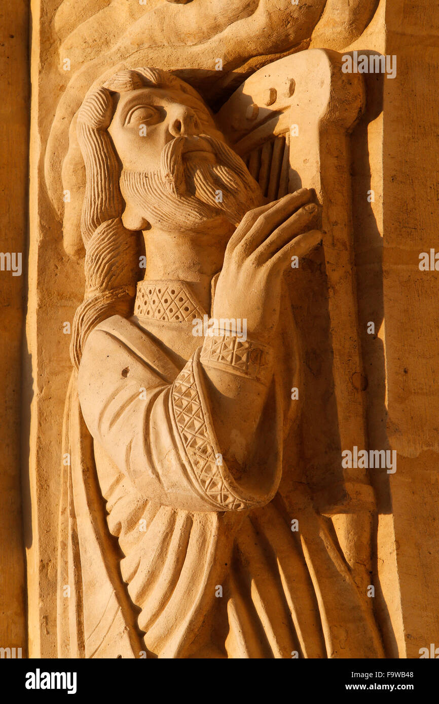 Saint Denis's basilica. Tympanum arch sculpture depicting king David ...