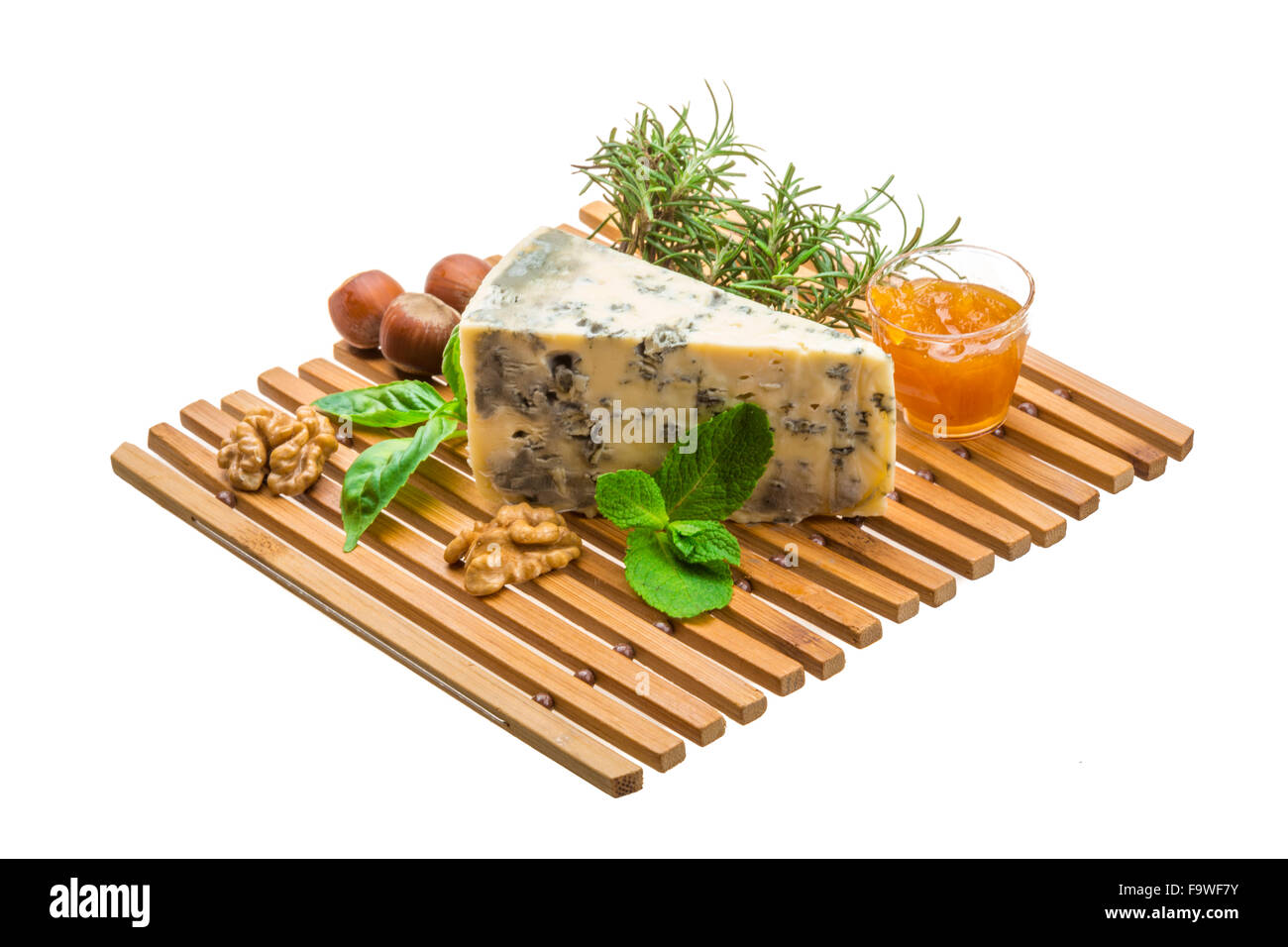 Dor blue cheese with herbs, nuts and honey Stock Photo - Alamy