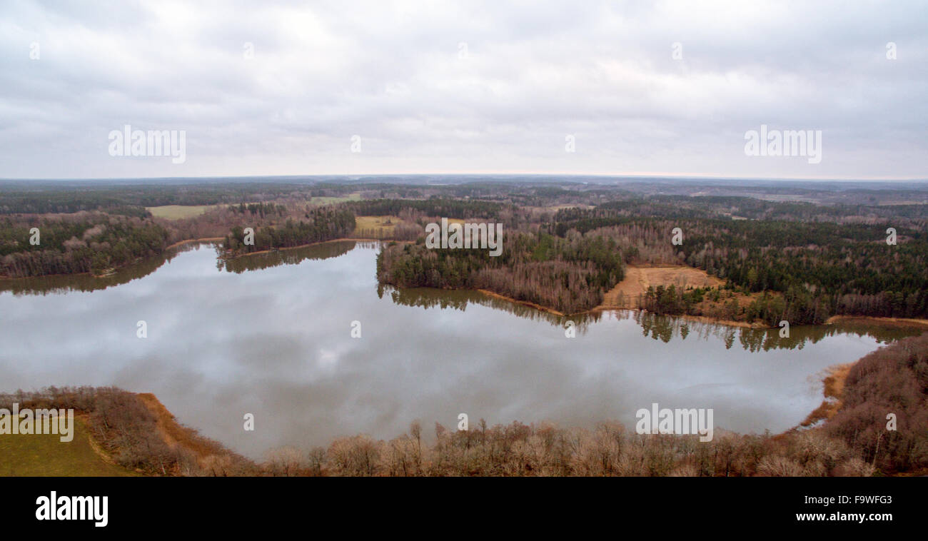 Lake from afar with the clouds reflecting on the surface Stock Photo ...
