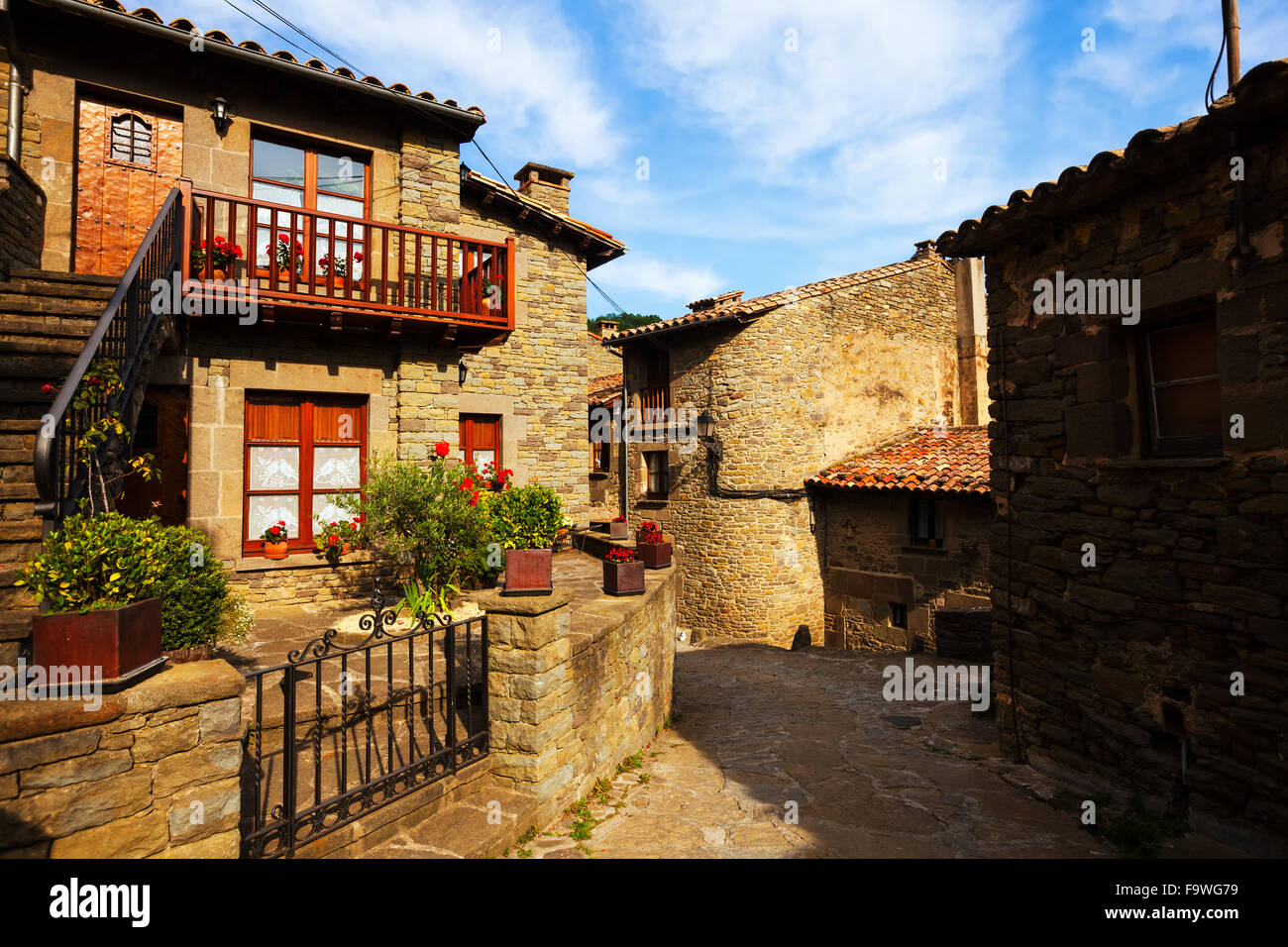 Old street in medieval Catalan village. Rupit, Catalonia Stock Photo ...
