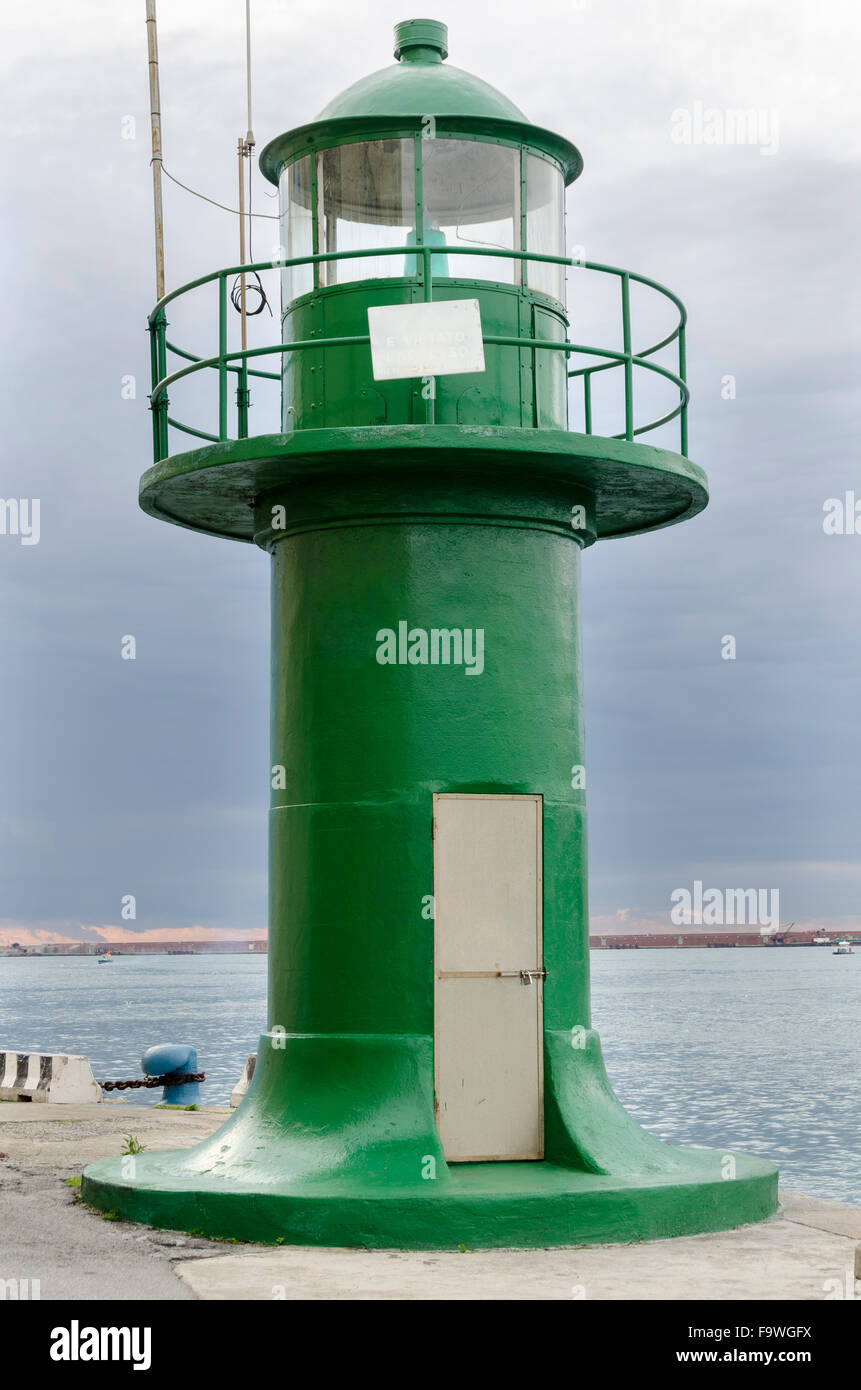 small green lighthouse in the port of Genoa Stock Photo - Alamy