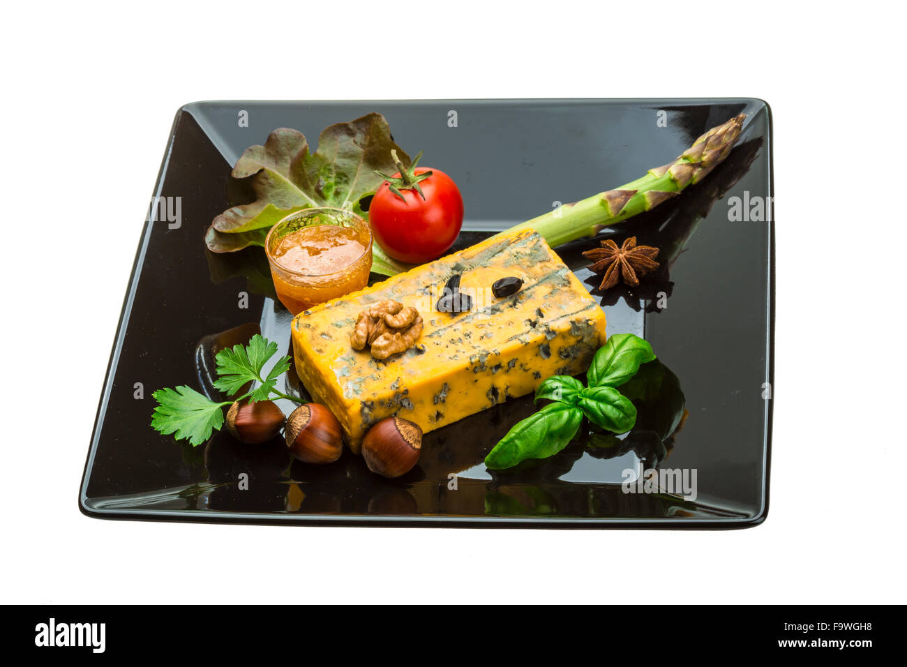 Gold cheese with mould Stock Photo - Alamy