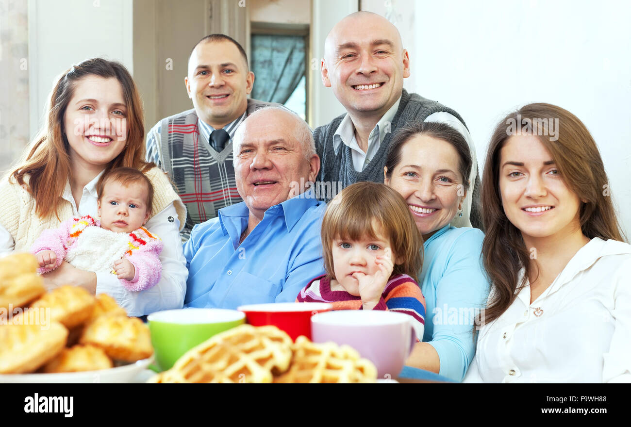 Portrait of happy large three generations family at home Stock Photo ...
