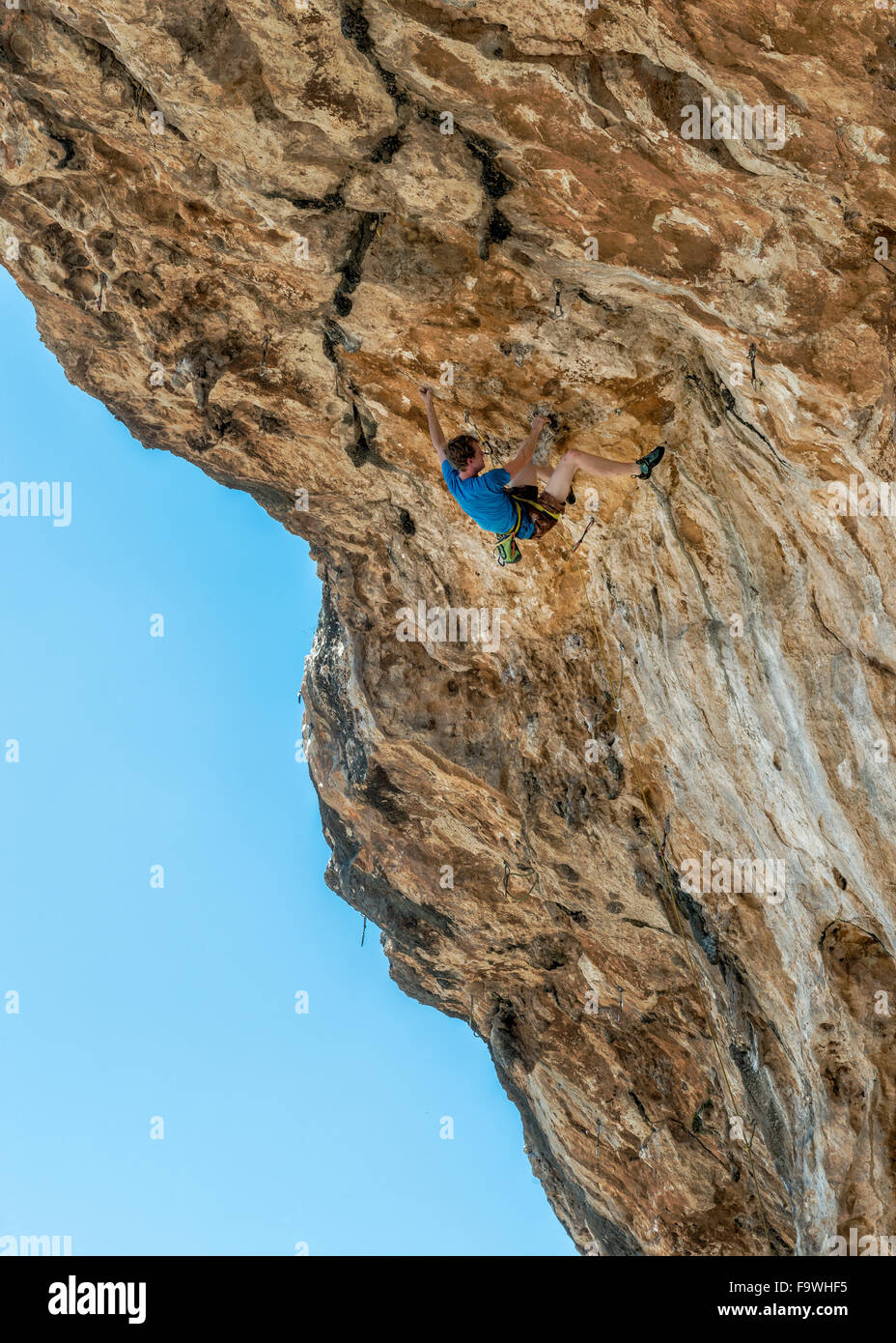 Malta, Ghar Lapsi, McCarthey's Cave, rock climber Stock Photo - Alamy