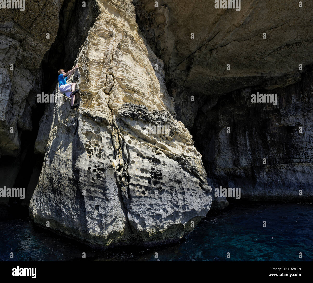 Malta, Blue Lagoon, rock climber Stock Photo - Alamy