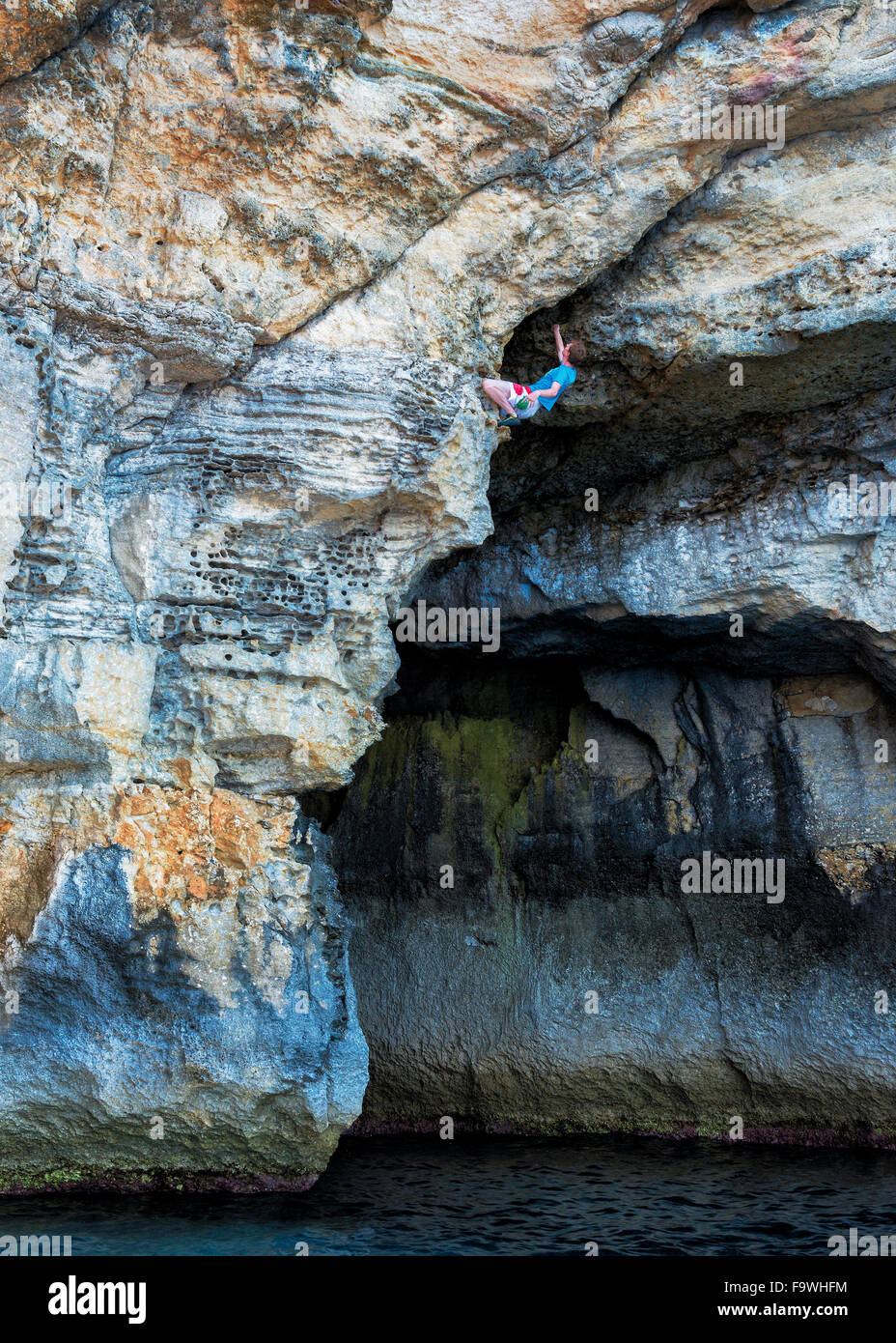 Malta, Blue Lagoon, rock climber Stock Photo - Alamy