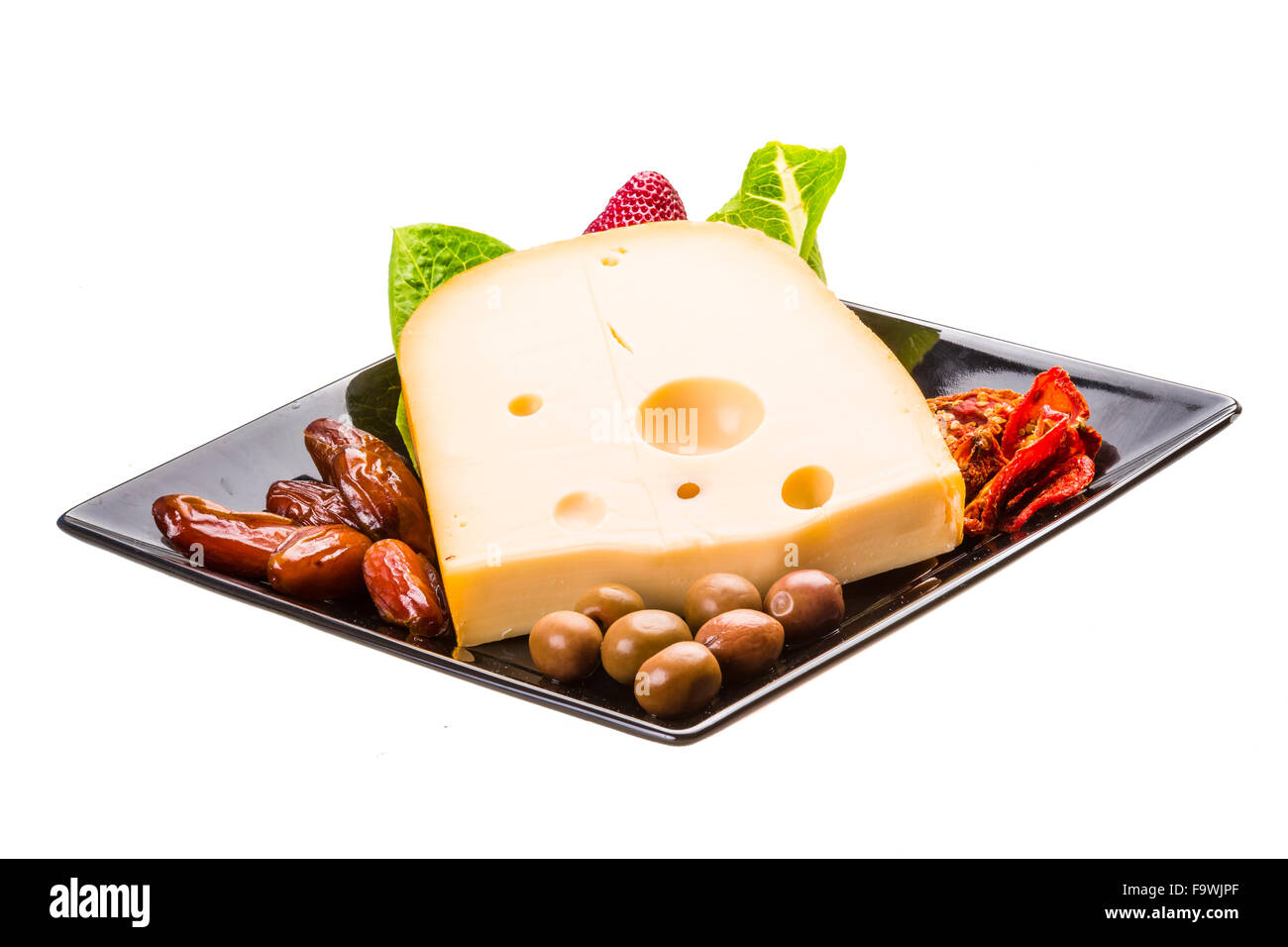 Yellow ripe cheese Stock Photo - Alamy