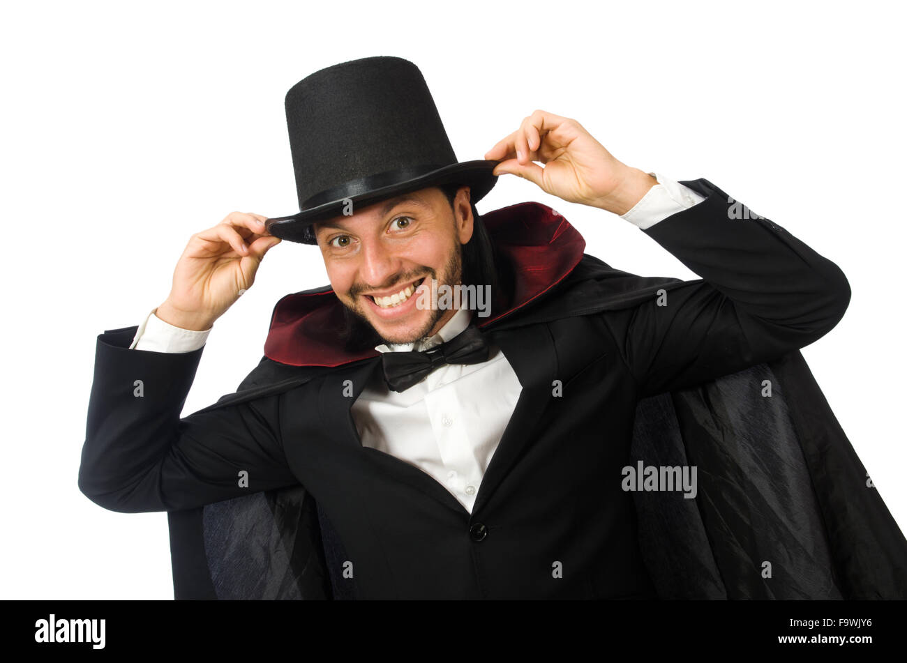 Man magician isolated on white Stock Photo - Alamy