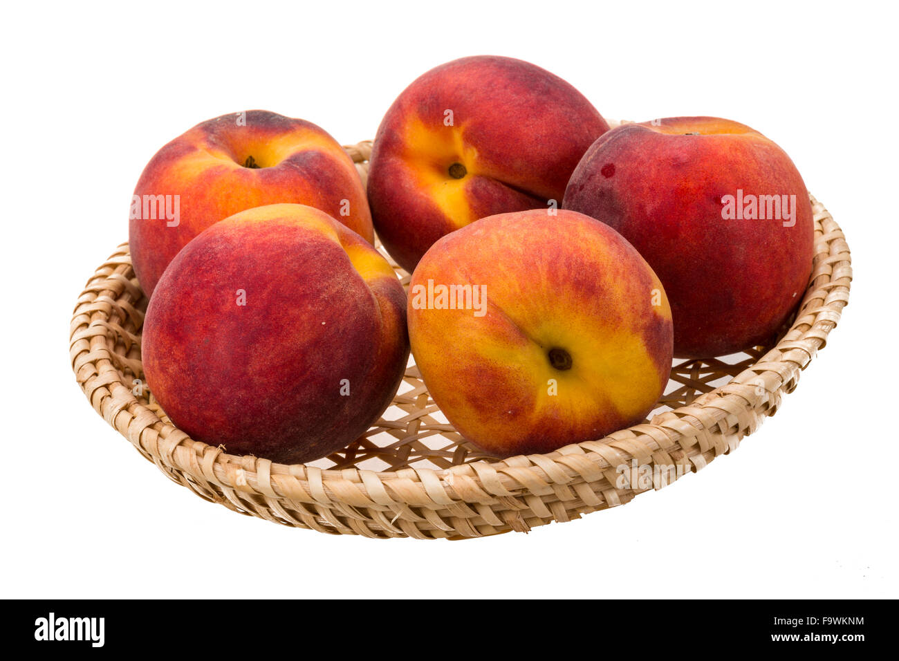 Ripe bright peaches isolated on white Stock Photo - Alamy